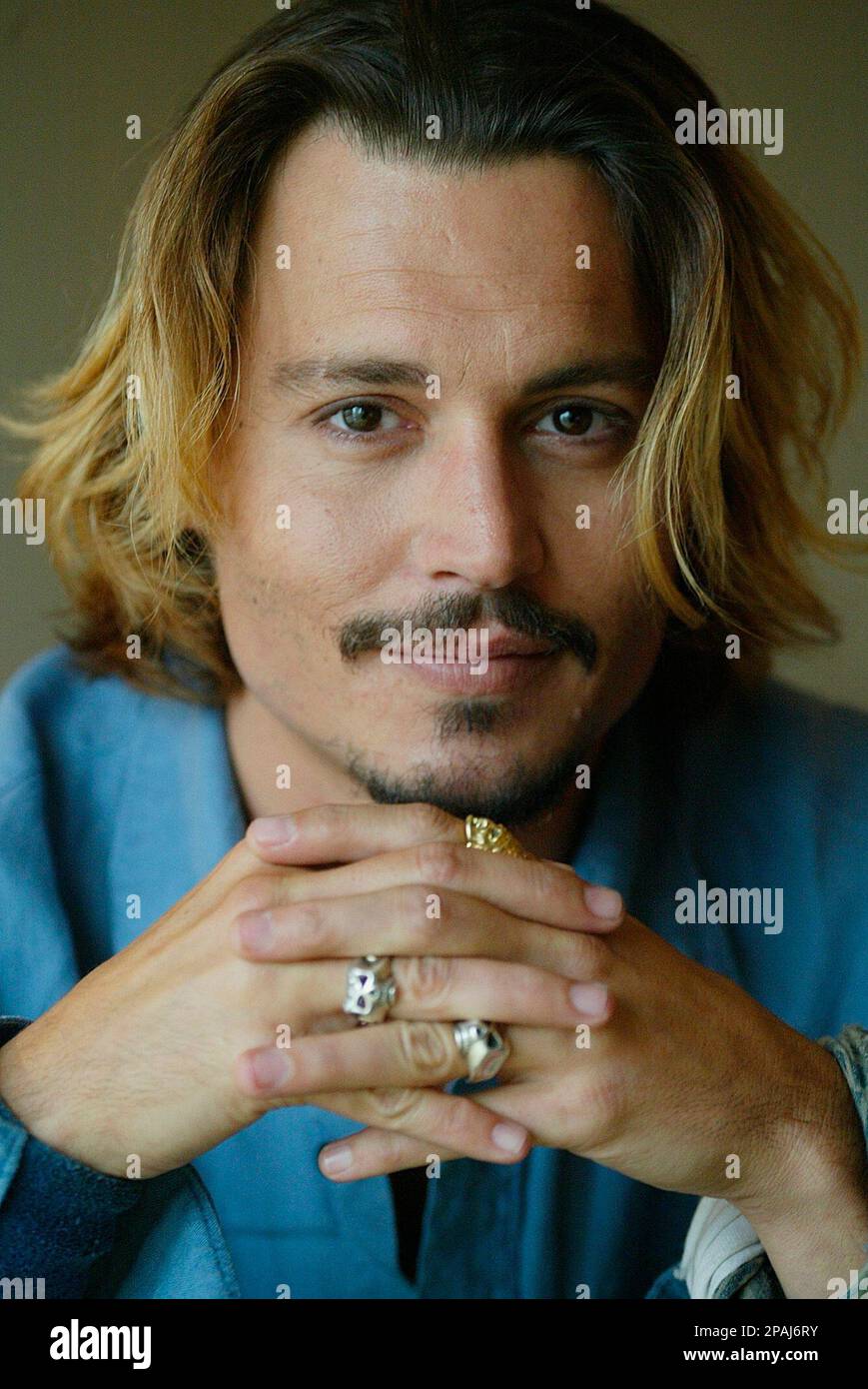 Actor Johnny Depp poses for a portrait June 21, 2003, in Los Angeles ...