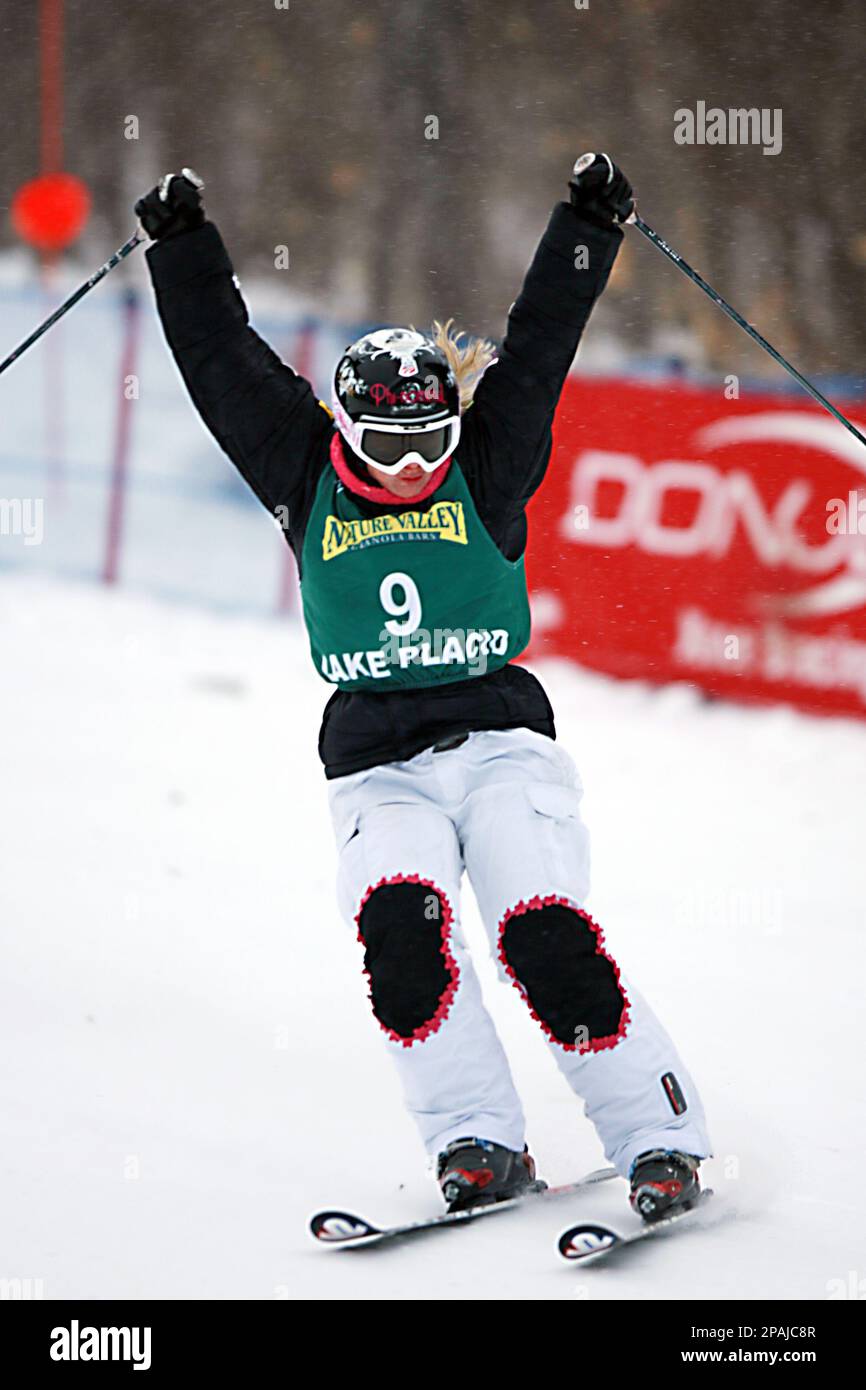Michelle Roark celebrates as she crosses the finish line at the World ...