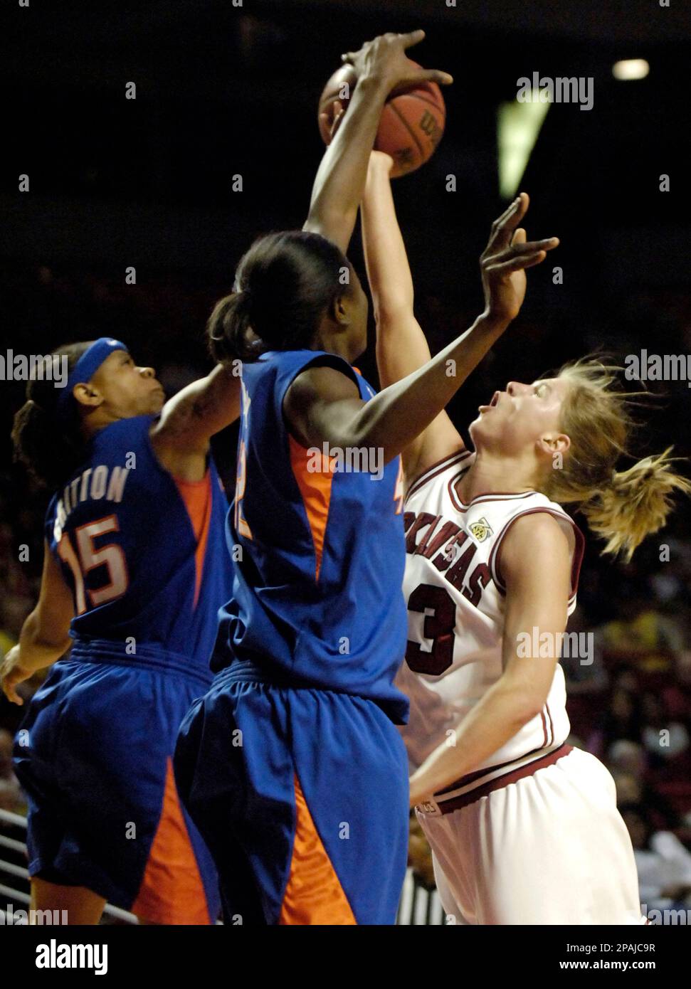 Florida's Kim Critton, left, and Aneika Henry battle Arkansas' Sarah ...