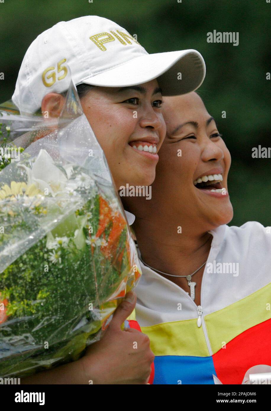 Philippines playersJennifer Rosales, right, and Dorothy Delasin, left ...