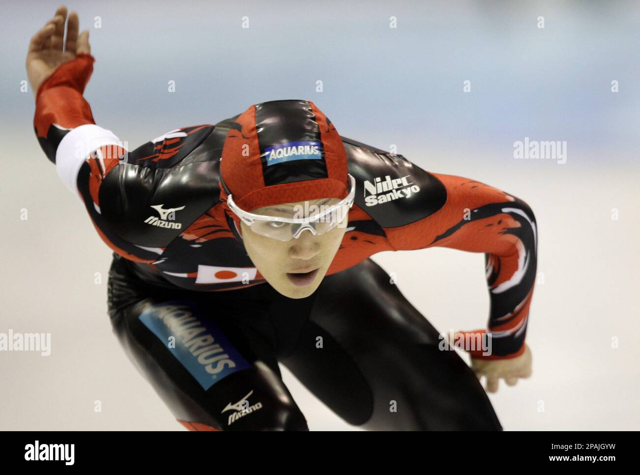 Joji Kato of Japan competes during the men's 1000 meter race at the ...