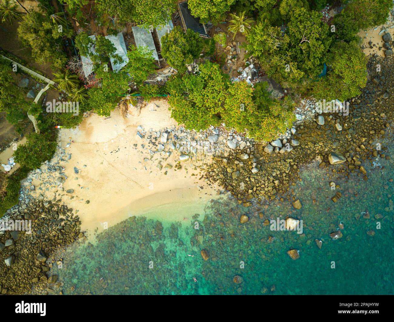 aerial top view Ao Sean small white sand beach lined with rocks ...