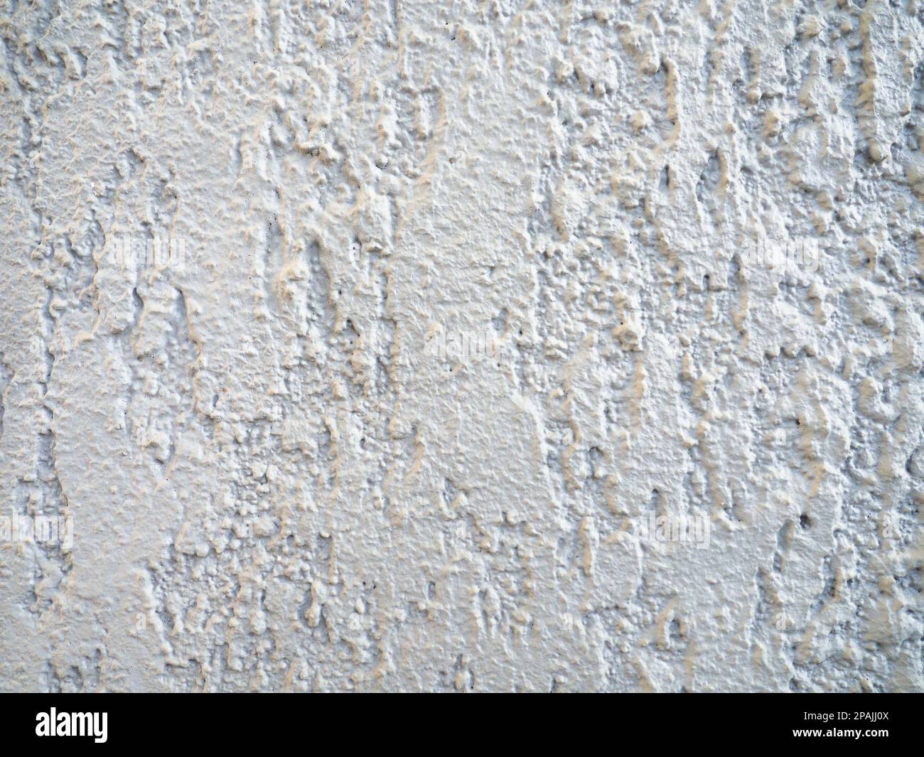 Rough light surface. Background from a stone wall. Cement stains. House ...