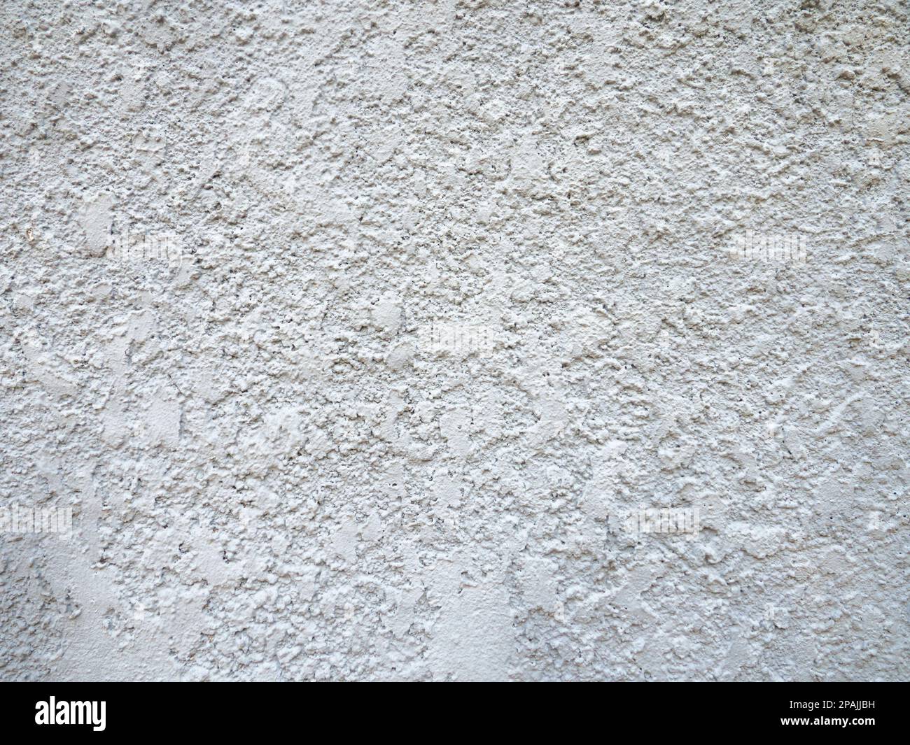 Rough light surface. Background from a stone wall. Cement stains. House ...