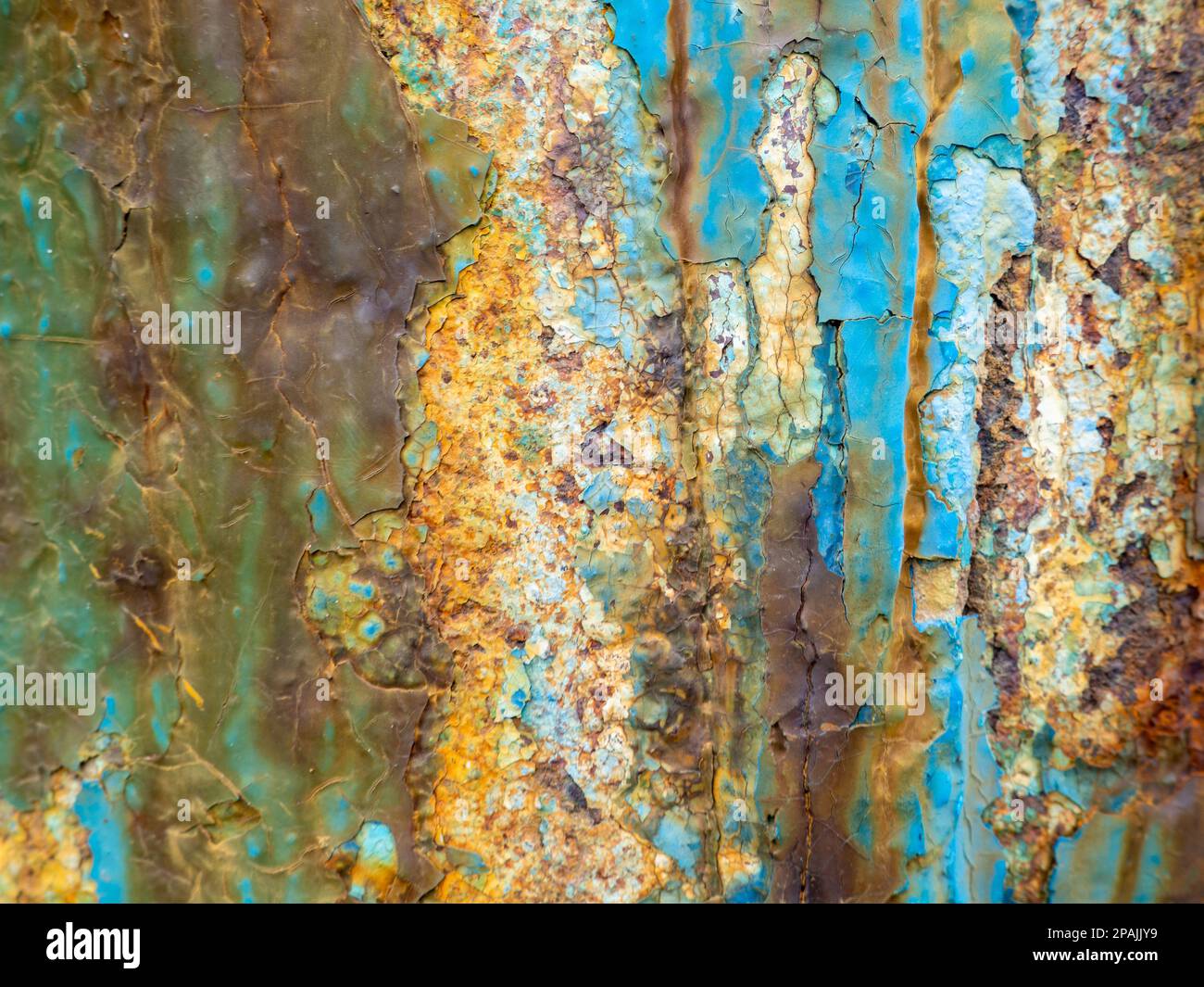 Rust on a blue surface. Cracks in the paint. Old iron. Rusty metal ...