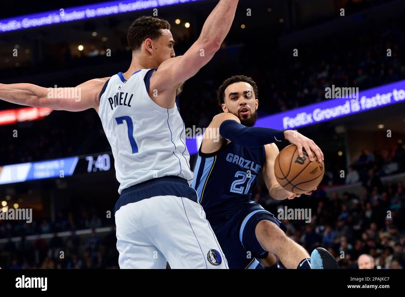Memphis Grizzlies guard Tyus Jones (21) passes the ball against Dallas ...