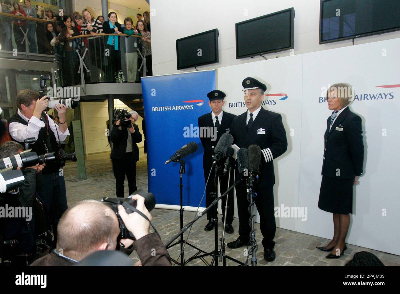 Captain Peter Burkill , centre, and his crew Cabin Service Director ...