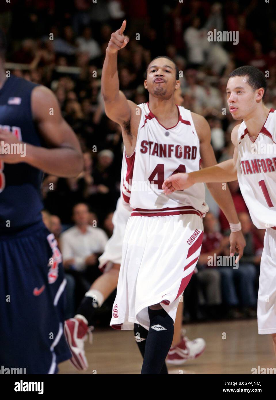 Stanford forward Fred Washington (44) celebrates in front of guard ...