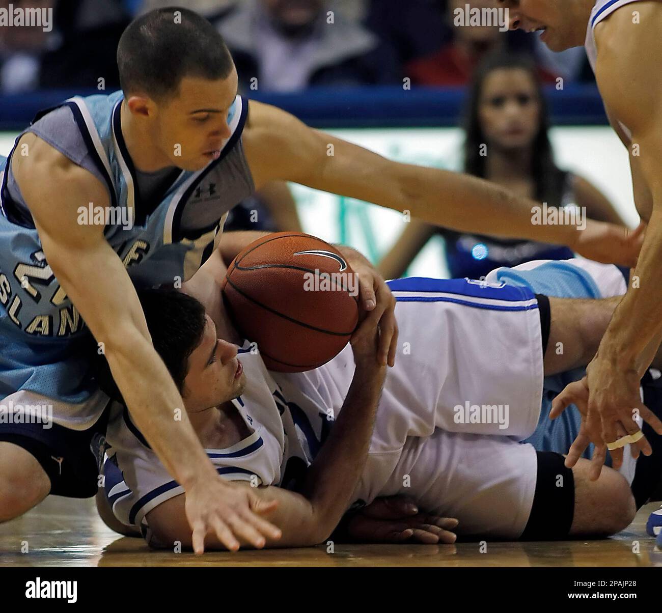 Rhode Island's Jimmy Baron, left, battles Saint Louis' Luke Meyer for ...