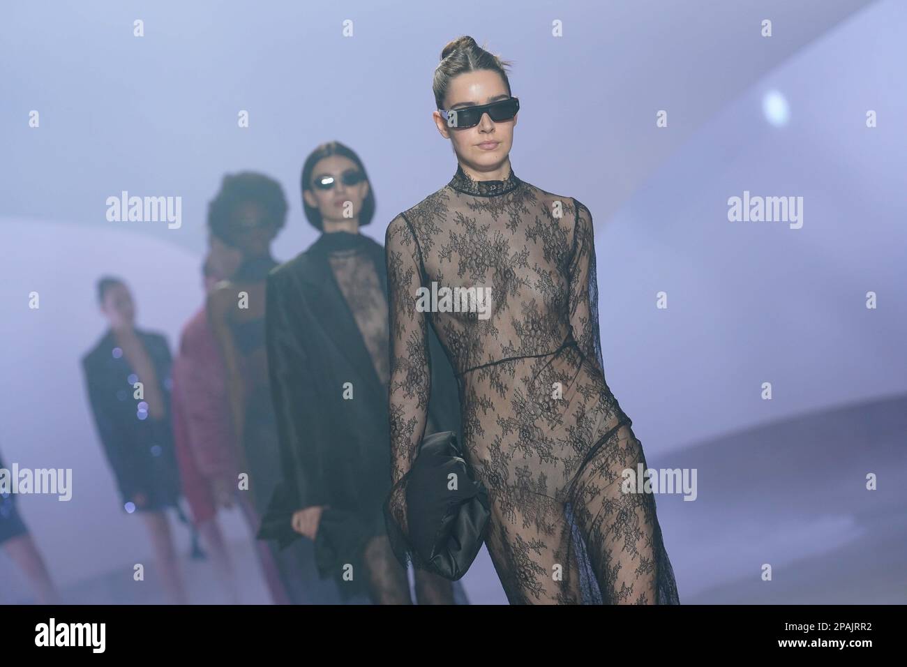 Lisbon, Portugal. 11th Mar, 2023. (EDITOR'S NOTE: Image contains nudity)A model walks the runway ...