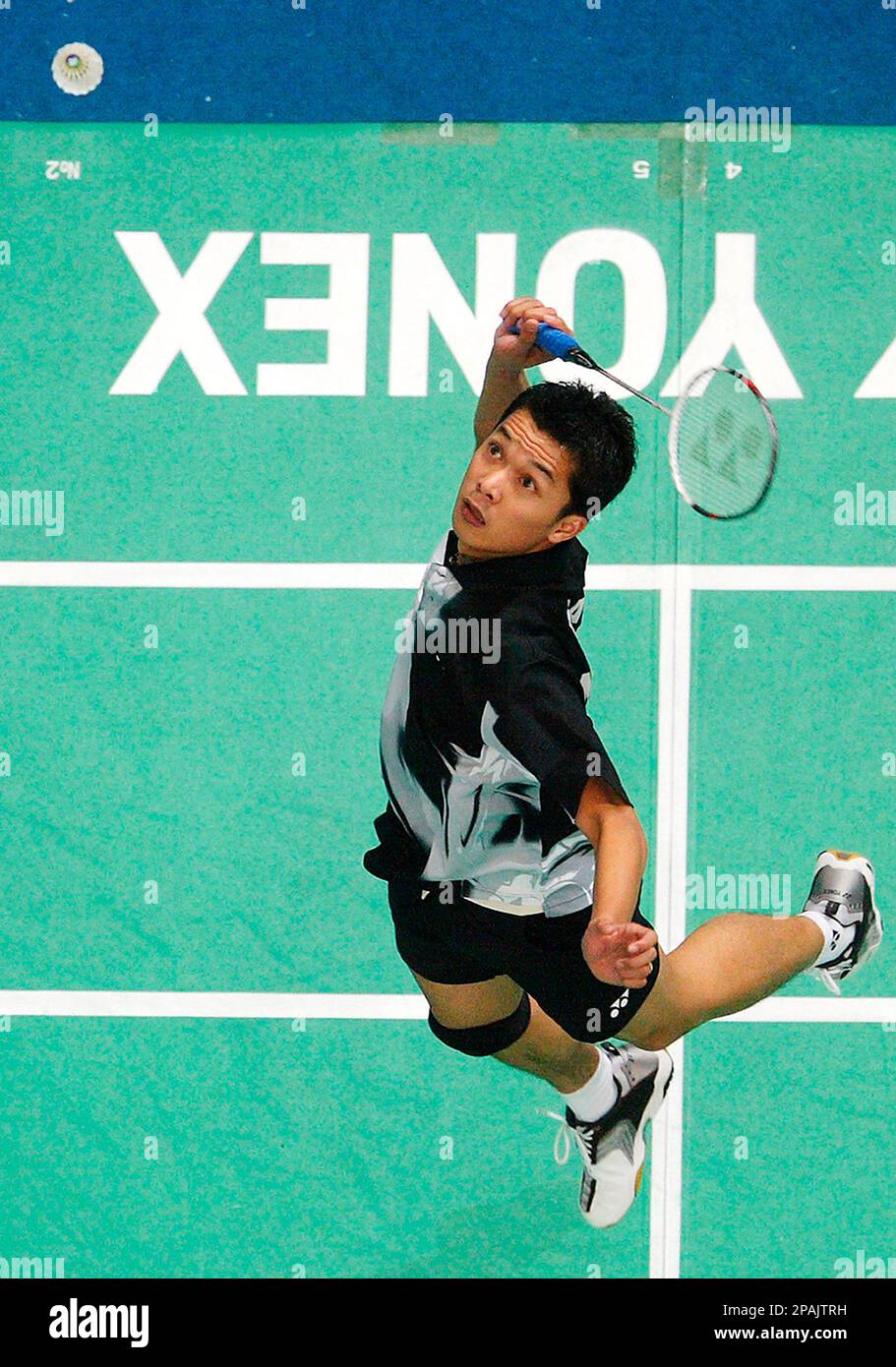 Taufik Hidayat of Indonesia keeps his eyes on the shuttle as he ...