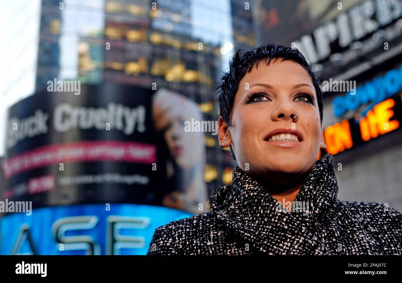 Singer Pink gives an interview in front of a new Times Square billboard ...
