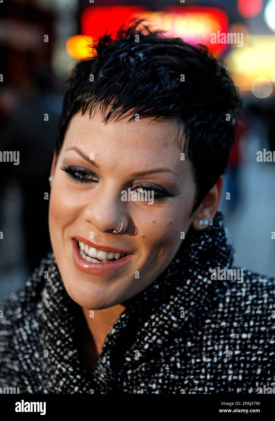 Singer Pink gives an interview in front of a new Times Square billboard ...