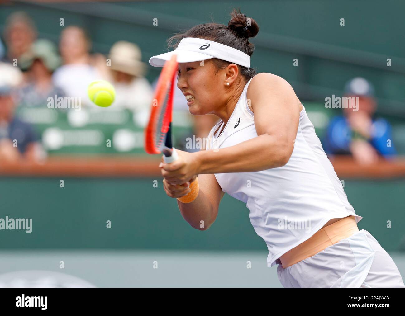 March 11, 2023 Claire Liu returns a shot against Iga Swiatek of Poland ...