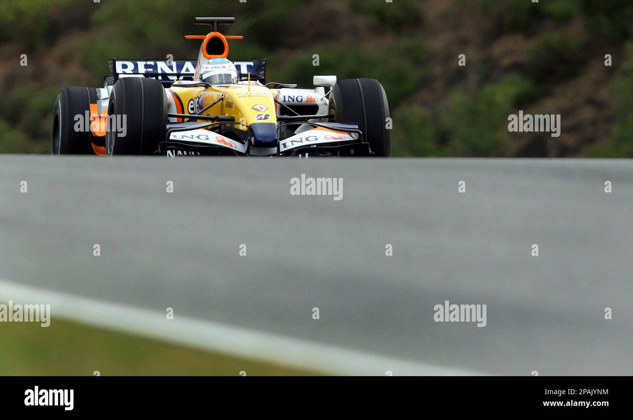 F1 driver Fernando Alonso drives his Renault during a test session at ...