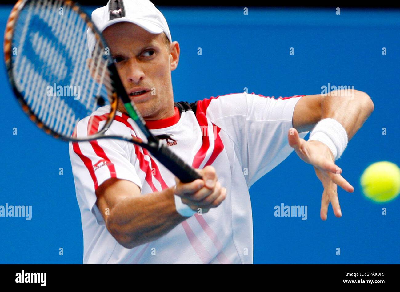 Nikolay Davydenko of Russia returns to Nicolas Mahut of France in their ...