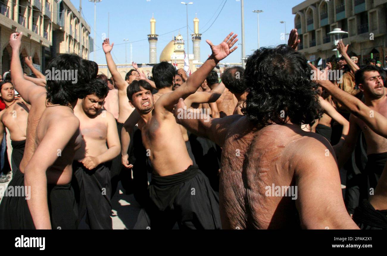 Devout Shiites beat their chests as sign of grief for Imam Hussein, in ...