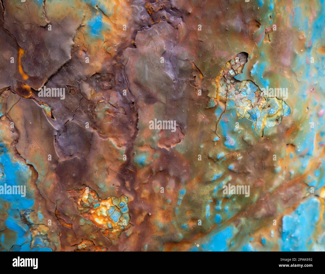 Rust on a blue surface. Cracks in the paint. Old iron. Rusty metal ...
