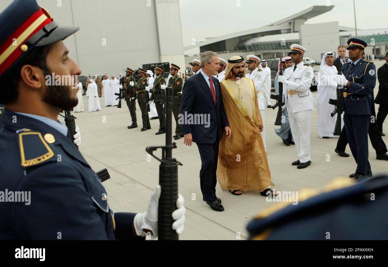 U.S. President George W. Bush, left, walks with United Arab Emirates ...