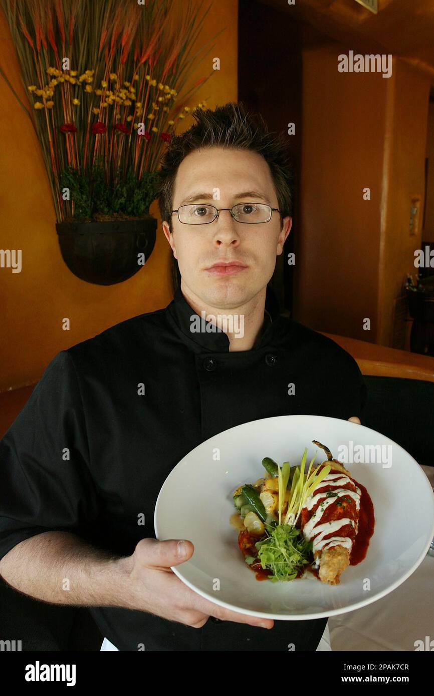 **ADVANCE FOR MONDAY, JAN. 14**Resort chef William Patterson holds the ...
