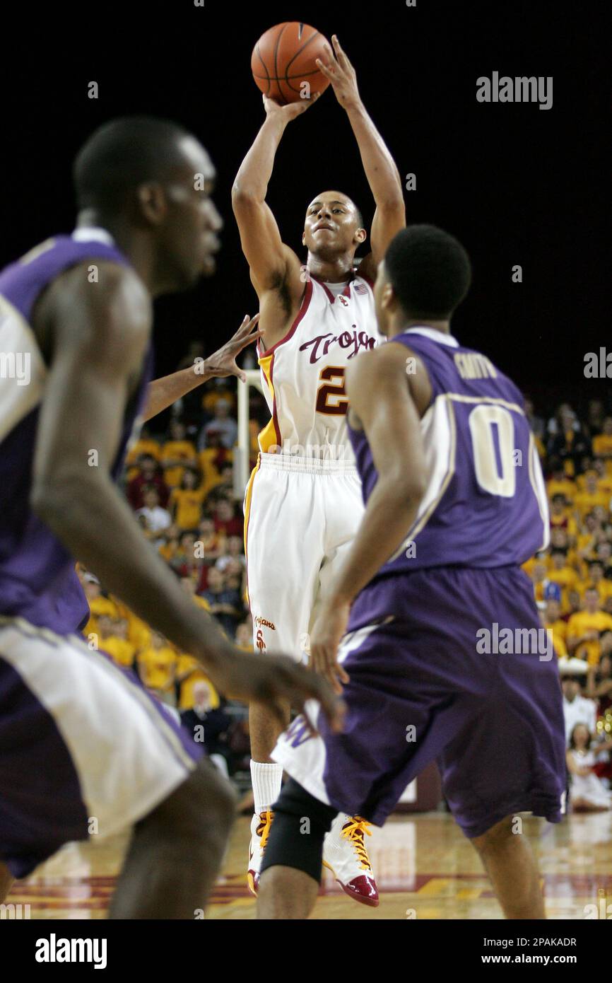 Southern California's Dwight Lewis shoots the ball while playing ...