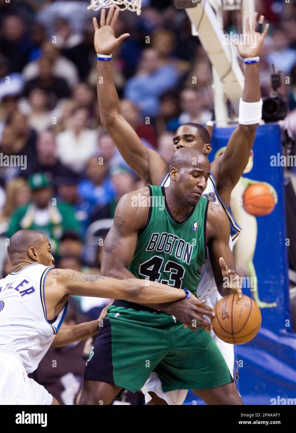 Boston Celtics' Kendrick Perkins (43) loses the ball as she is double ...