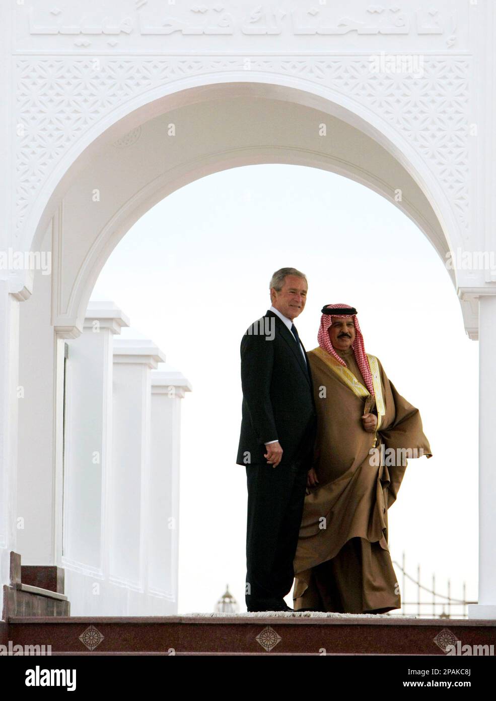 US President George W. Bush, left, stands with Bahrain's king, Hamad ...