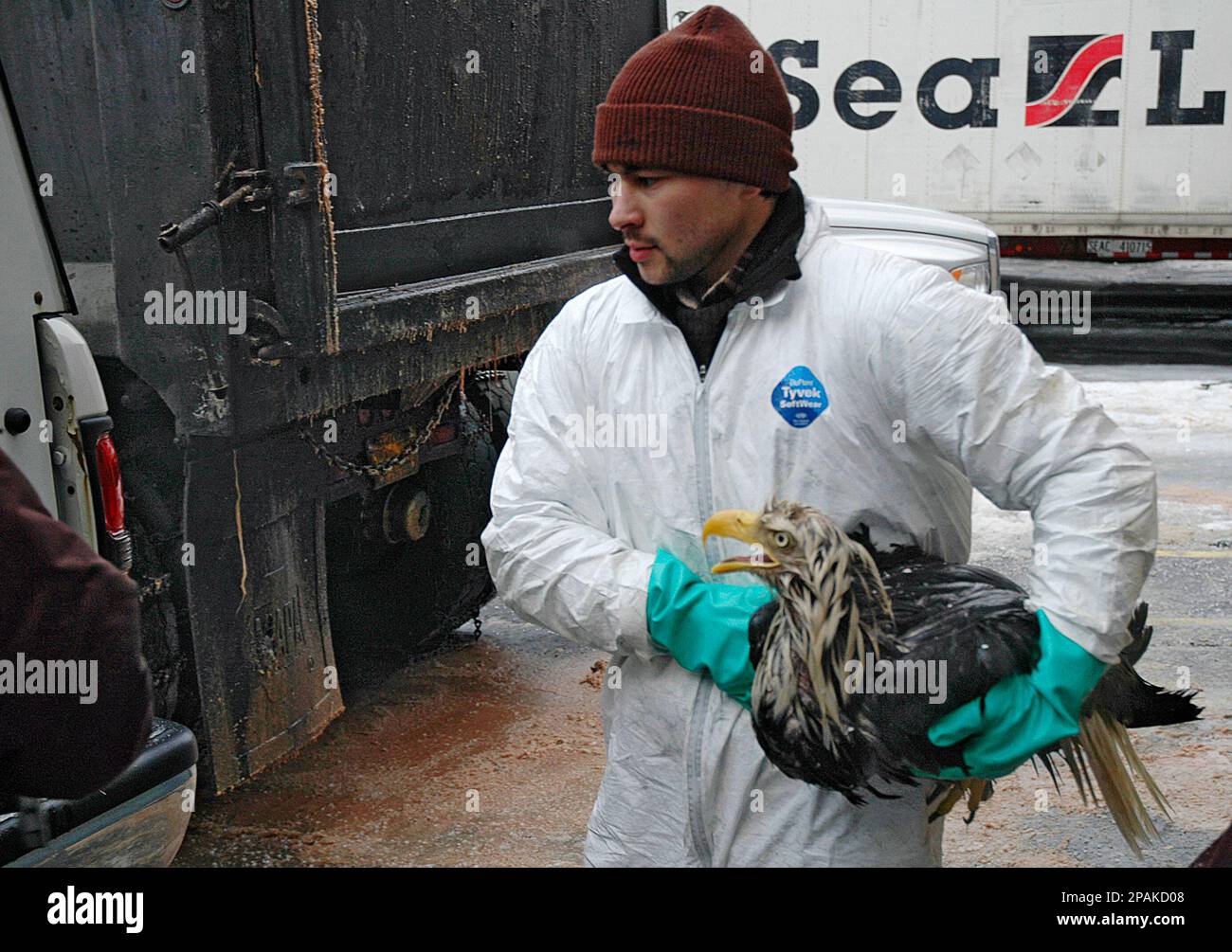 Brandon Saito, a biologist with the U.S. Fish and Wildlife Service ...