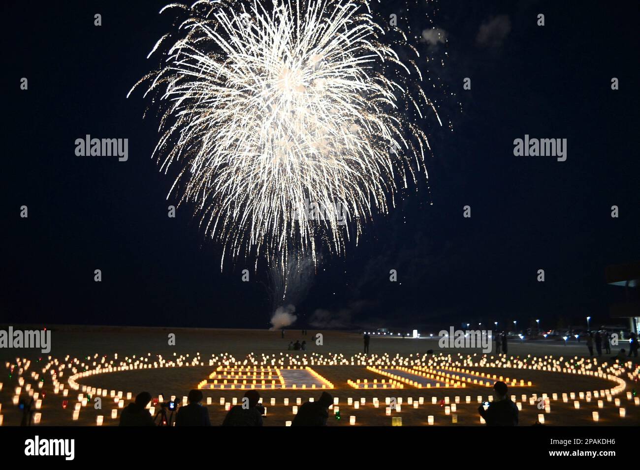 Candles are lit to pray for the victims of the 2011 Tohoku Earthquake ...