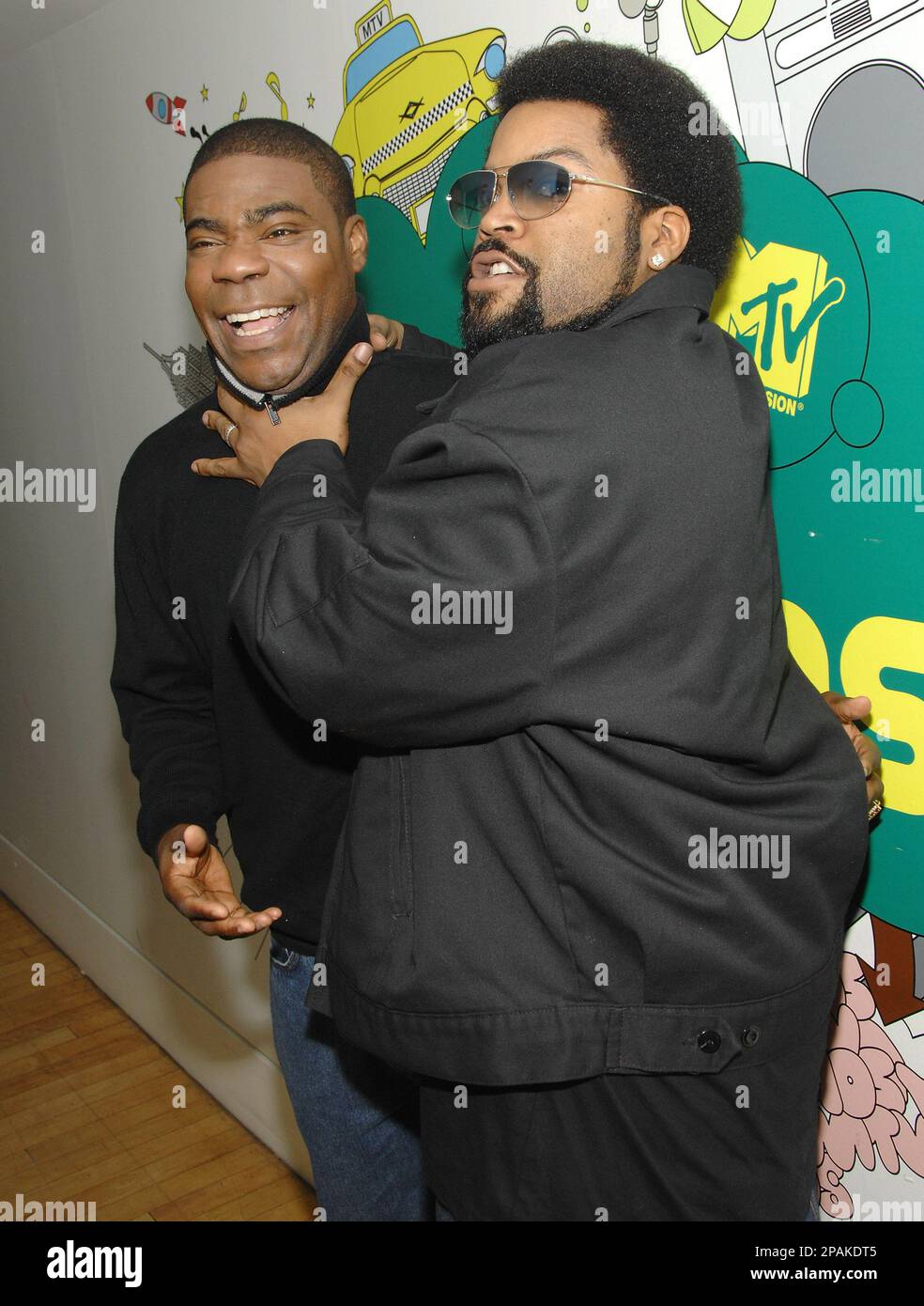 Actor Tracy Morgan, left, and actor Ice Cube pose together backstage ...