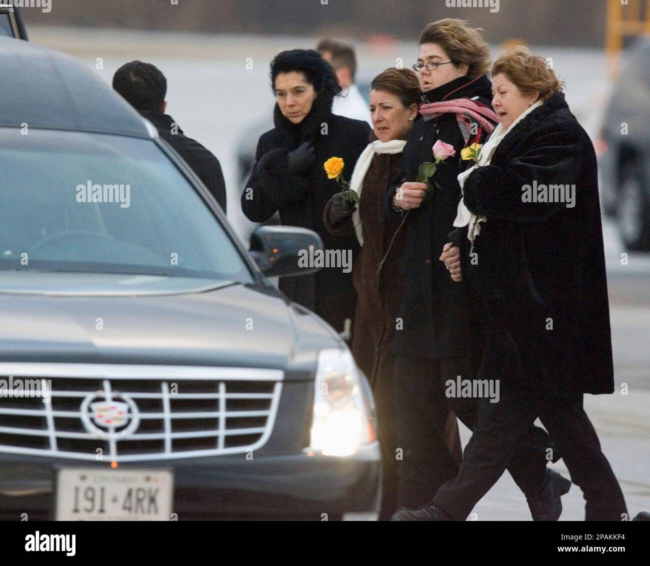 Family members arrive to view the casket of Corporal Eric Labbe in the ...