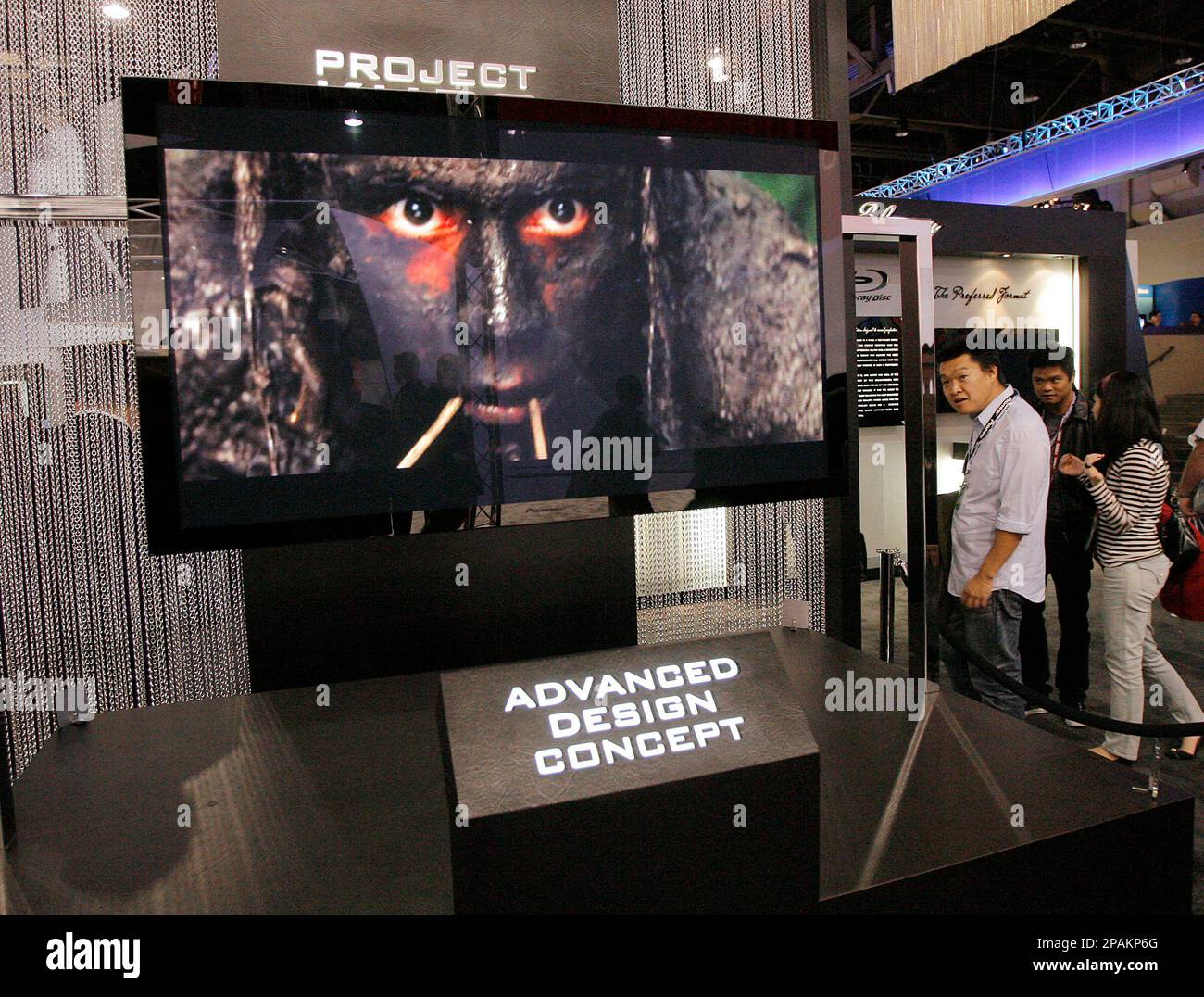Show attendees look at Pioneer's Kuro prototype flat-panel television ...