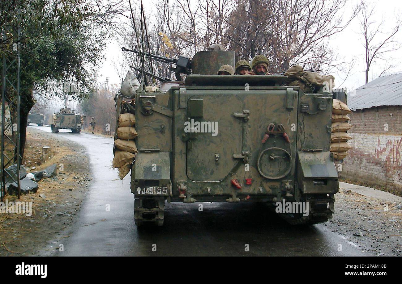 A convoy of Pakistan's Army armored vehicles patrol in a road on the ...