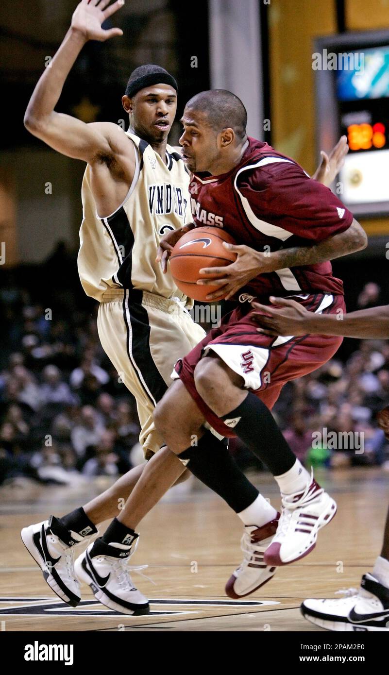 Vanderbilt's Shan Foster, left, defends against Massachusetts forward ...
