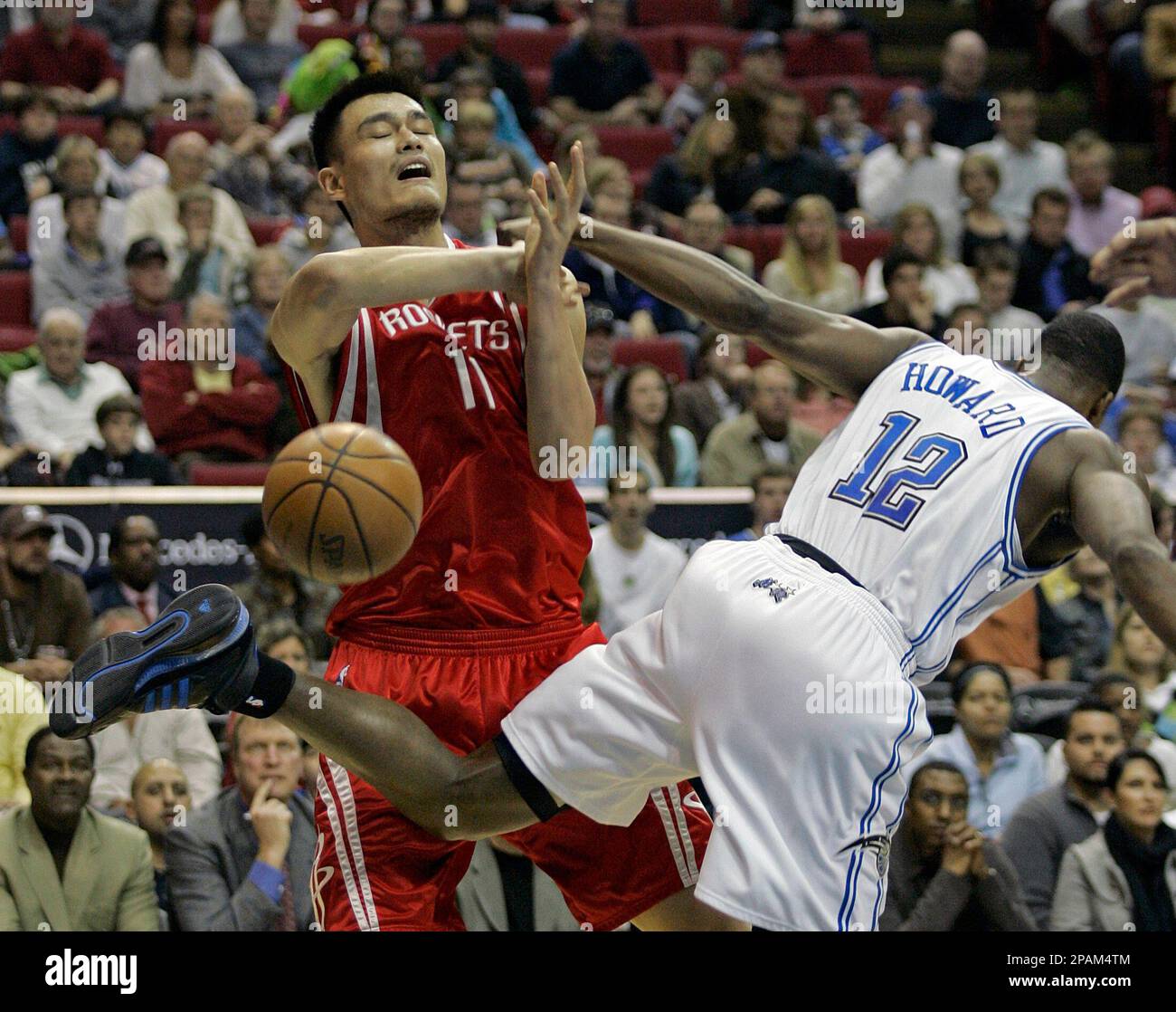 Houston Rockets center Yao Ming (11), of China, loses control of the ...