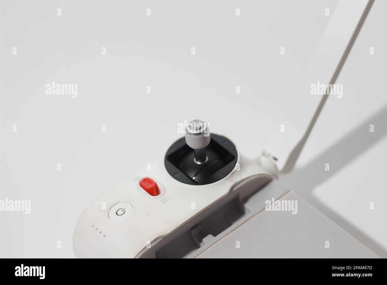 a close up of detailed white drone remote parts isolated on white ...