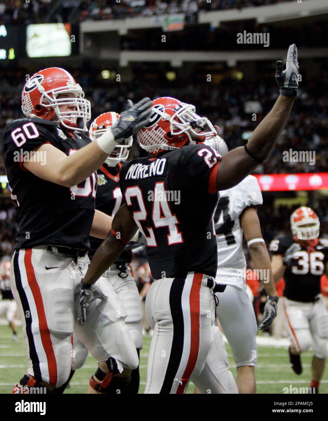 Georgia running back Knowshon Moreno (24) is congratulated by offensive ...