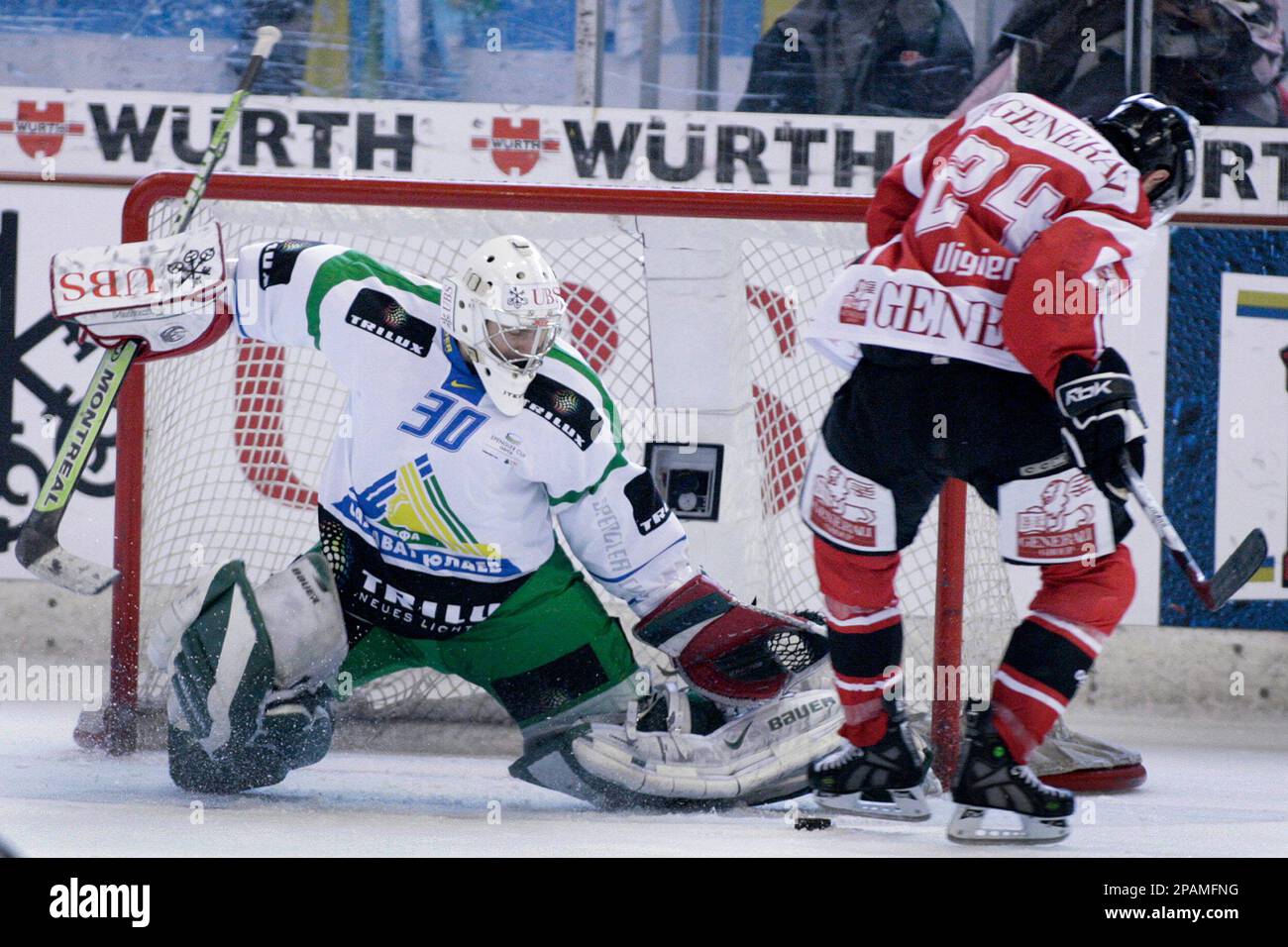 Team Canada's Jean-Pierre Vigier, right, confronts with the goalkepeer ...