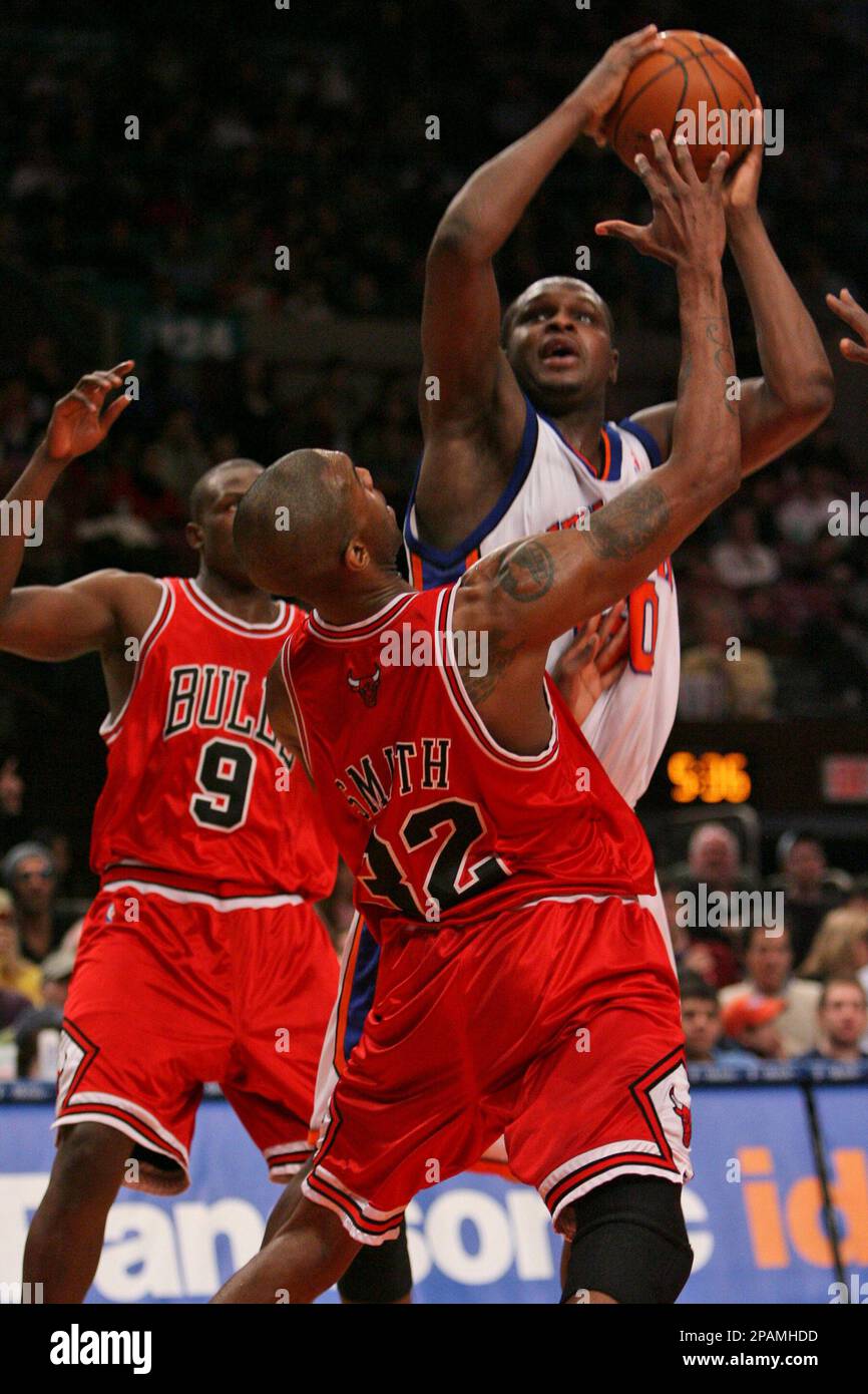 New York Knicks' Zach Randolph, top, goes to the basket against Chicago ...
