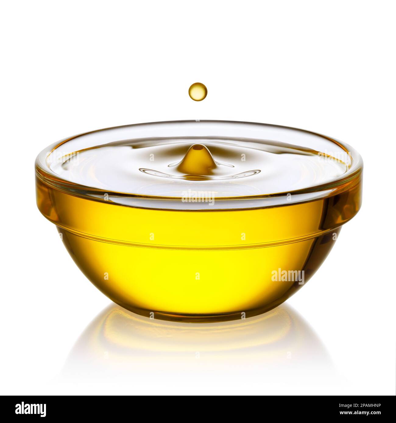 cooking oil with flying drop in glass bowl isolated on white Stock ...