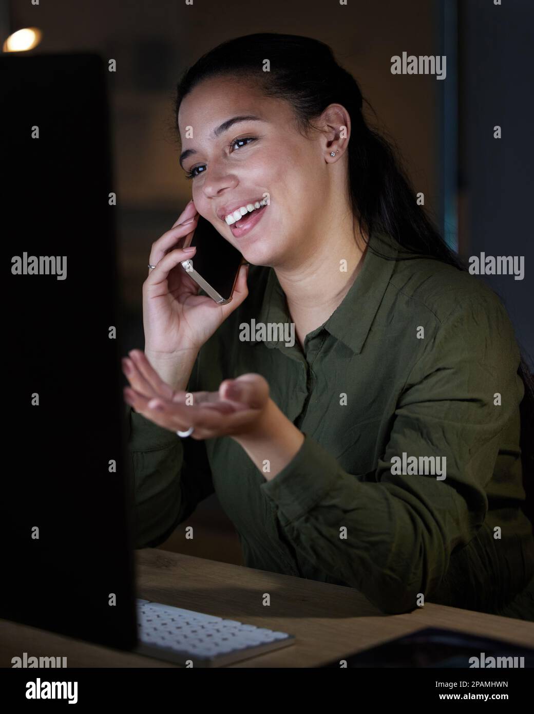 Phone call, smile and night with a business woman in her office ...