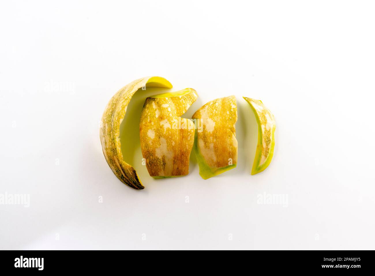 pumpkin skin after peeling on white background, pumpkin skin has been a ...