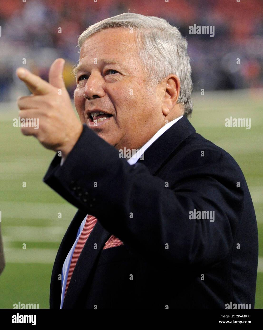 New England Patriots owner Robert Kraft gestures to fans before the ...
