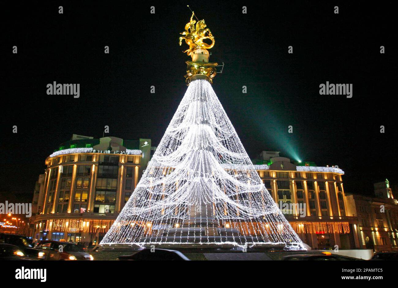 A New Year tree of lights rises in downtown Tbilisi, Georgia, Thursday ...