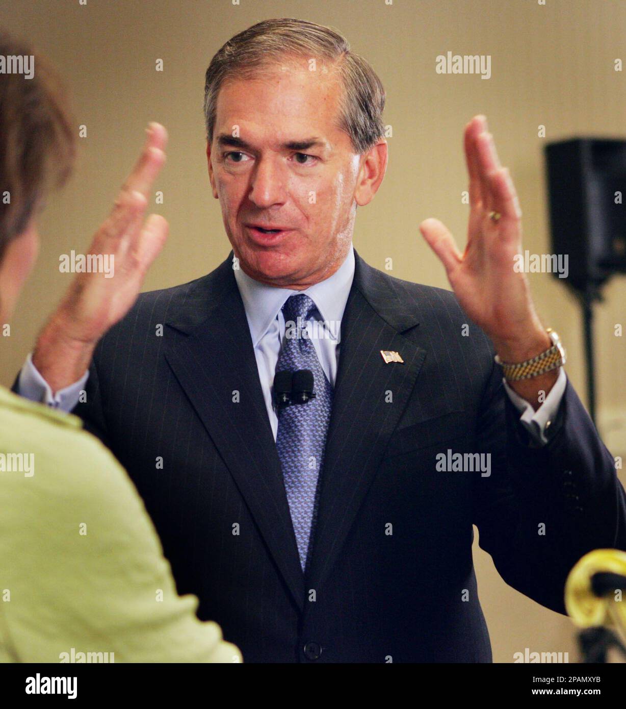 ** FILE ** Former Sprint Corp. chairman and CEO Gary Forsee talks with ...