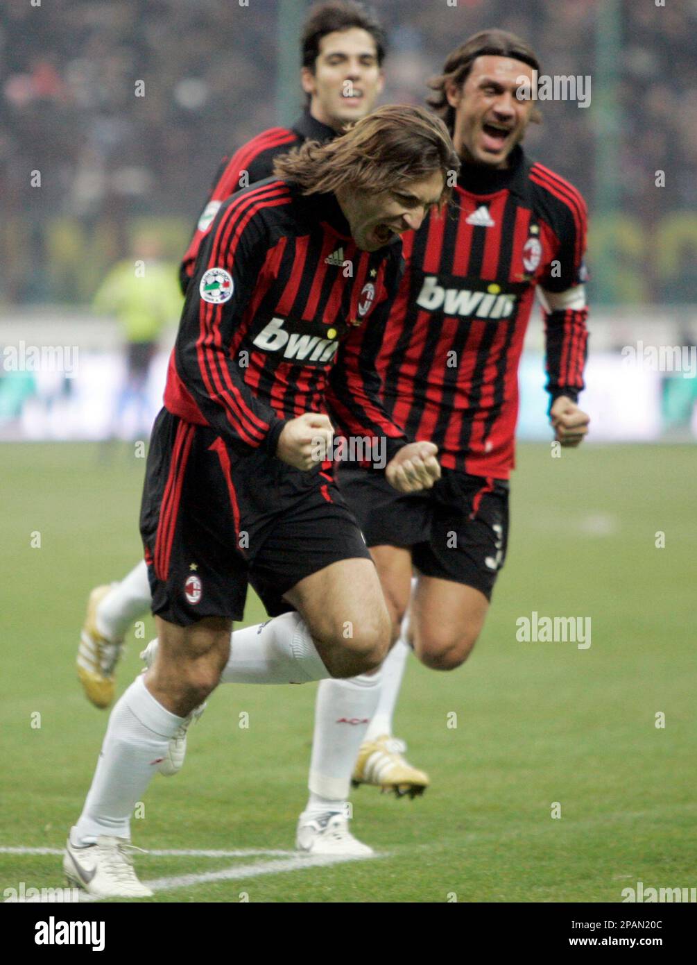 AC Milan midfielder Andrea Pirlo, center, celebrates with his teammates ...