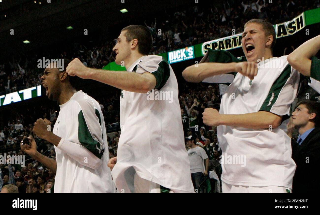 Michigan State reserve players, from left, Idong Ibok, Isaiah Dahlman ...