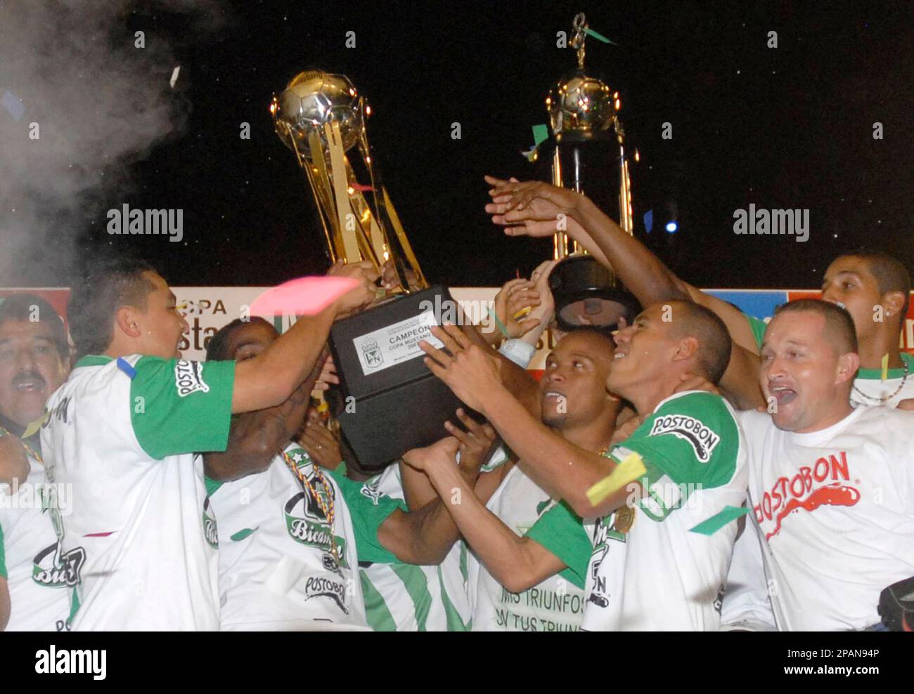 Atletico Nacional's players celebrate with the trophy at the end of the ...