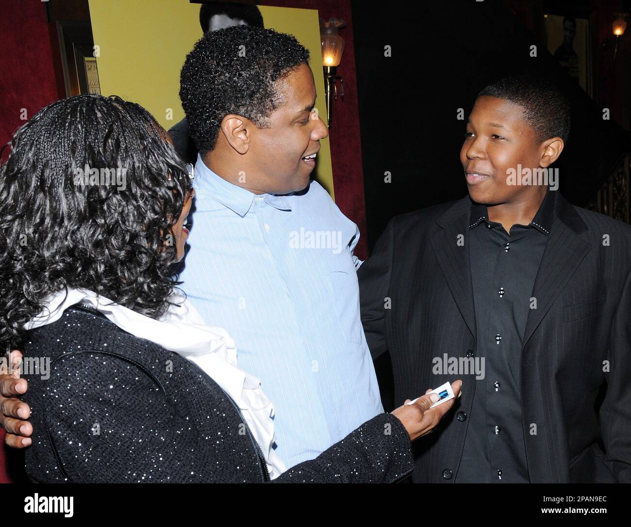 Director-actor Denzel Washington, center, and his wife Pauletta greet ...