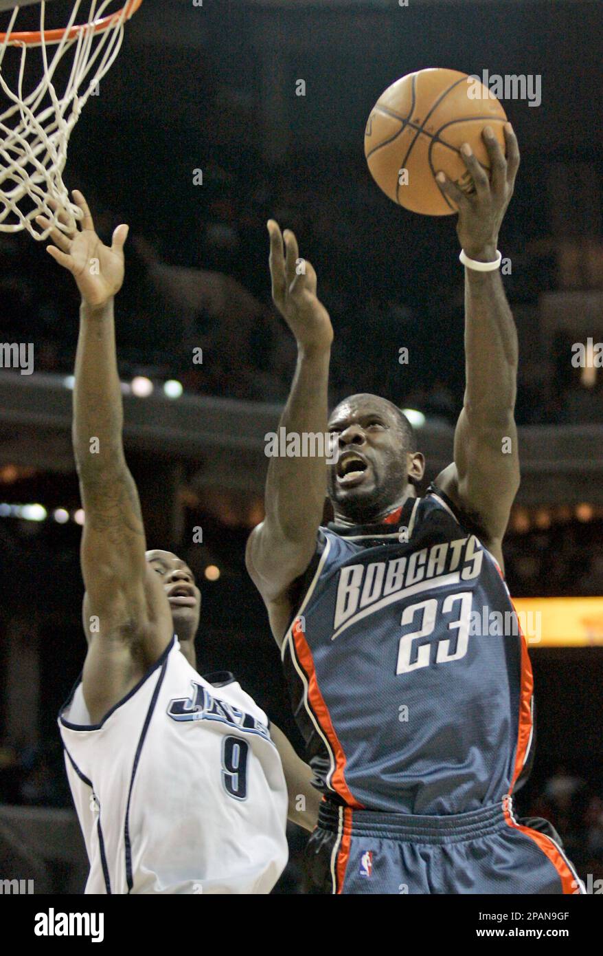 Charlotte Bobcat's Jason Richardson (23) drives to the basket as Utah ...